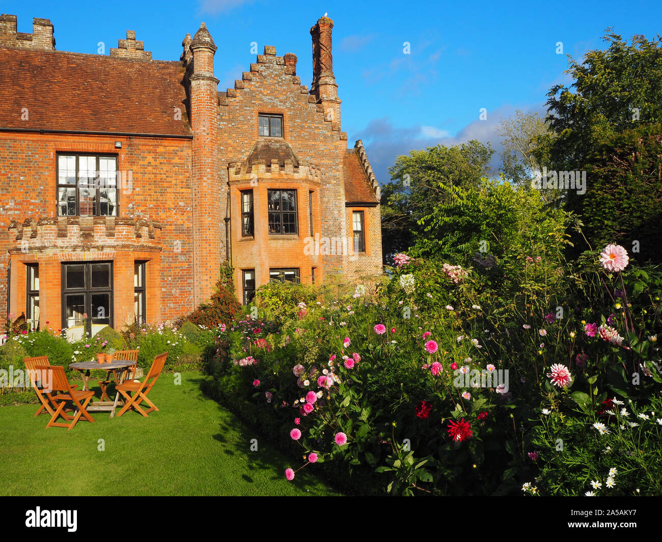 Chenies Manor House from main lawn.Fine weather, blue sky and ancient ...