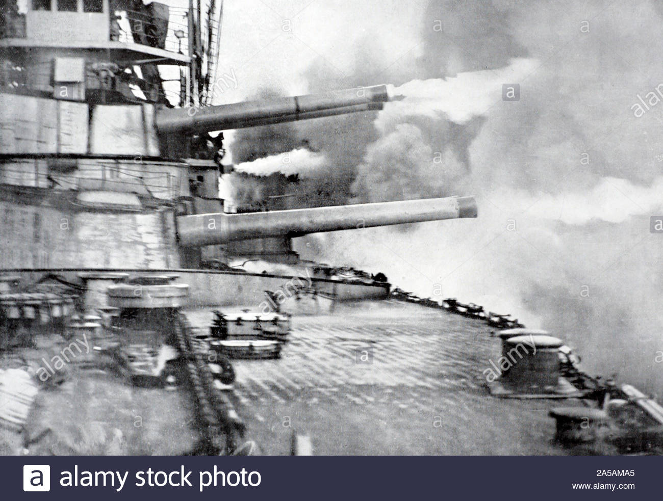 WW1 British Dreadnought warship firing a salvo, vintage photograph from ...