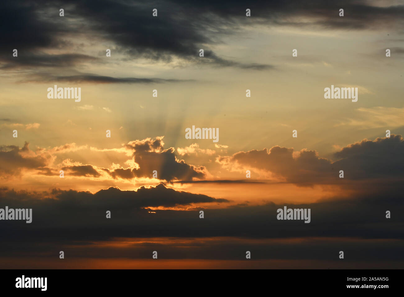 sunrise over Atlantic Ocean clouds partially blocking sun Stock Photo ...