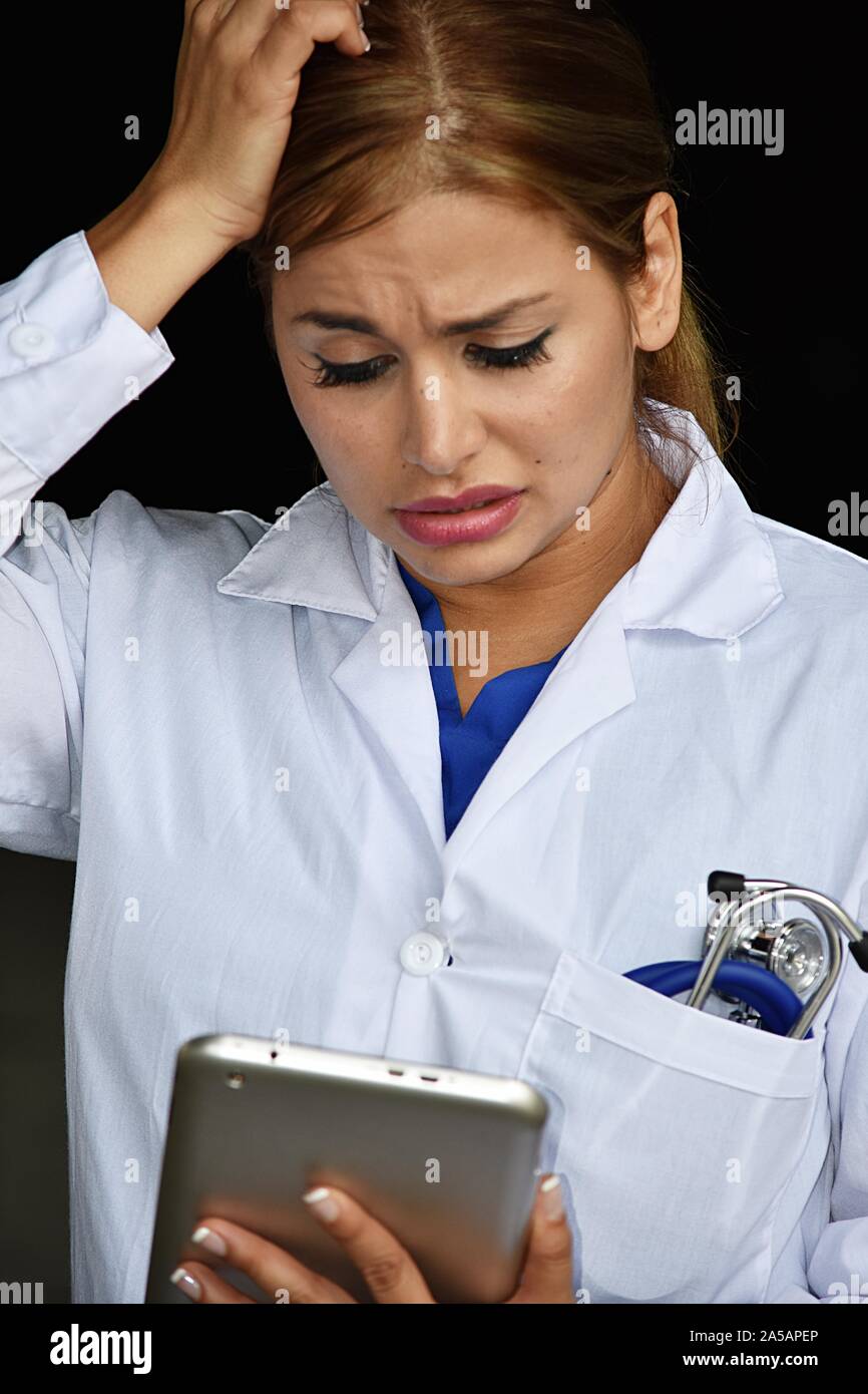 Thoughtful female doctor hi-res stock photography and images - Alamy