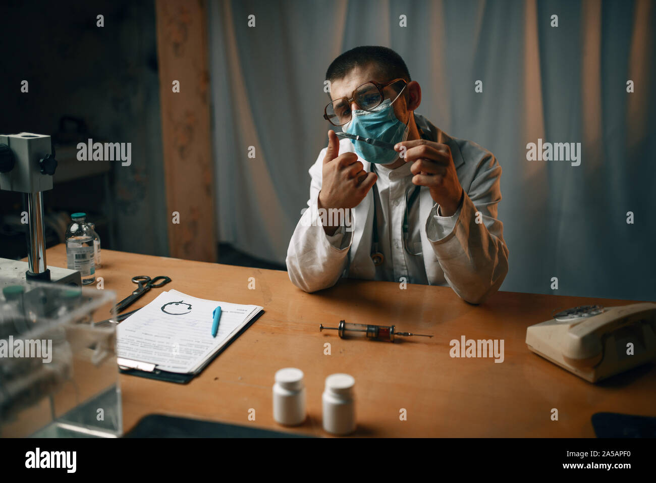 Psychiatrist in mask and glasses, mental hospital Stock Photo - Alamy