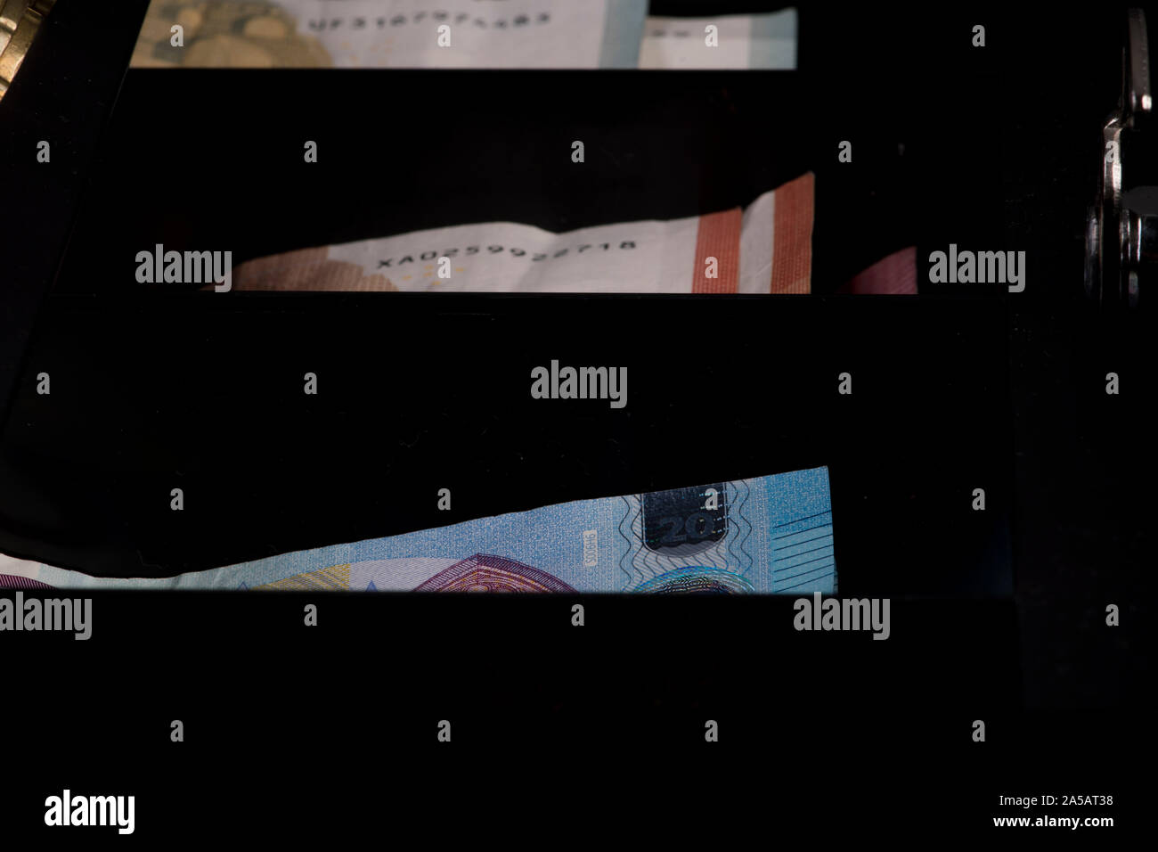 Cash box with euro banknotes in individual compartments Stock Photo - Alamy