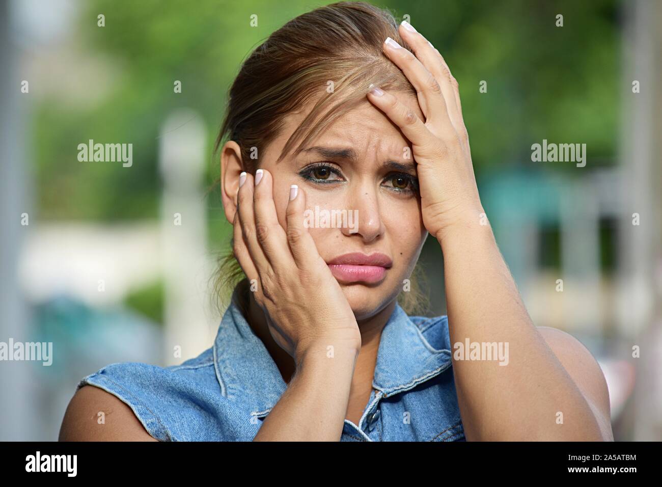 Worried Young Diverse Person Wearing Jeans Jacket Stock Photo - Alamy