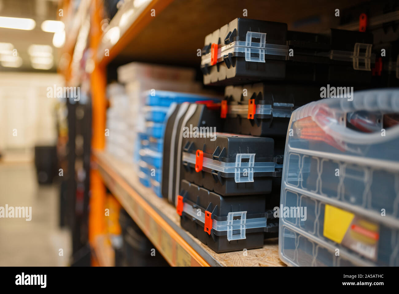Hardware store assortment, shelf with toolboxes Stock Photo - Alamy