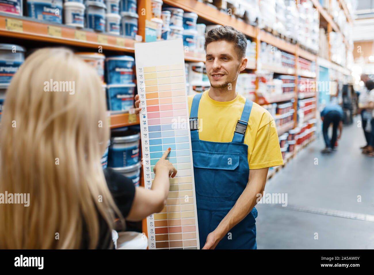 Female shop assistant uniform hi-res stock photography and images - Alamy