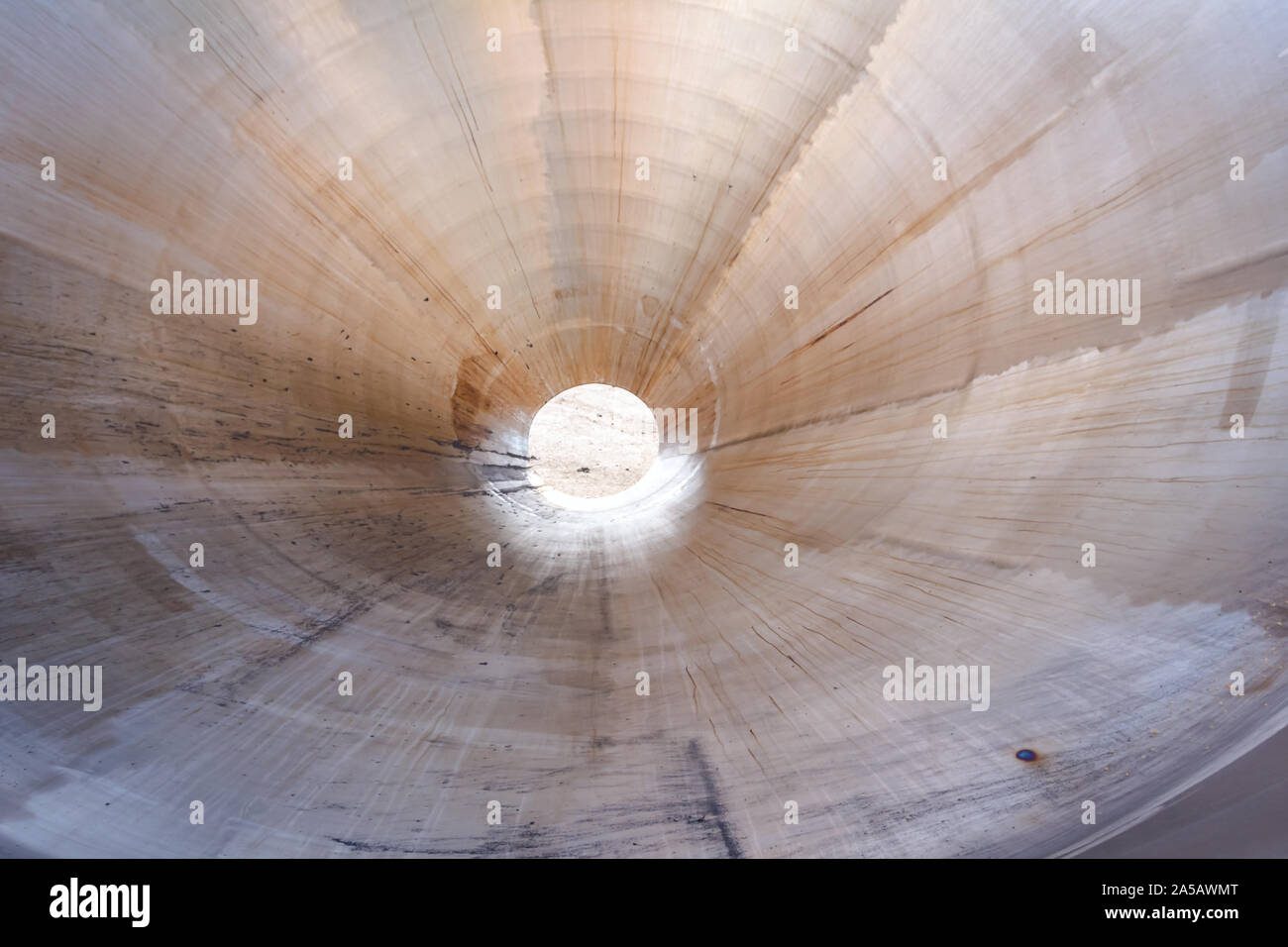 Perspective view inside of huge silo, reservoir made of stainless steel ...