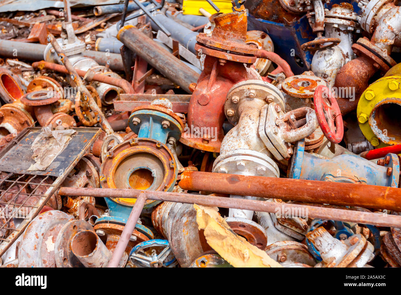 Different shapes and sizes of cut old valves and equipment, industrial ...