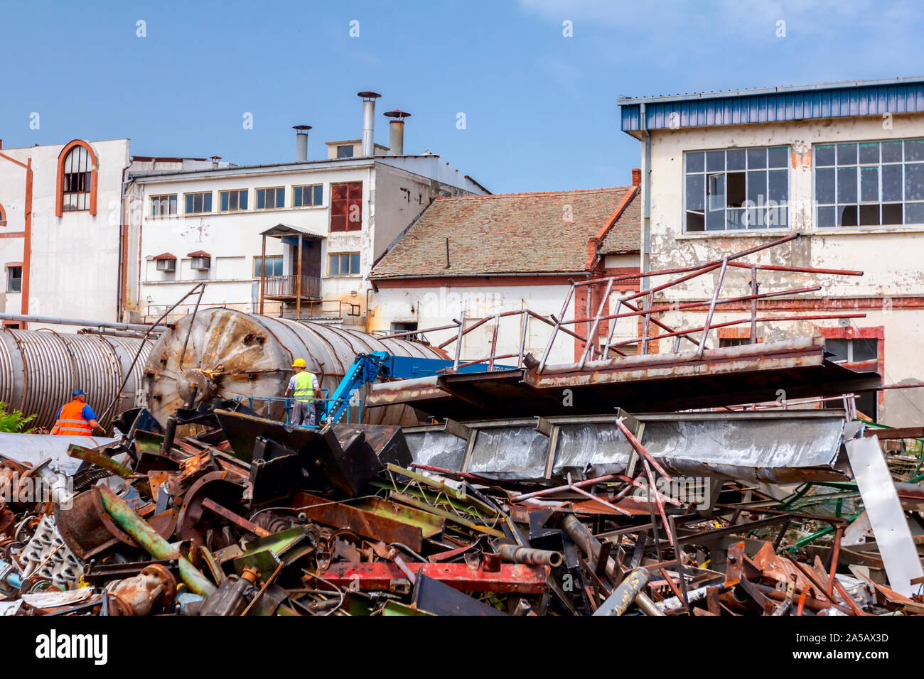 Piled up scrap metal, old profiles and equipment, parts of old ...