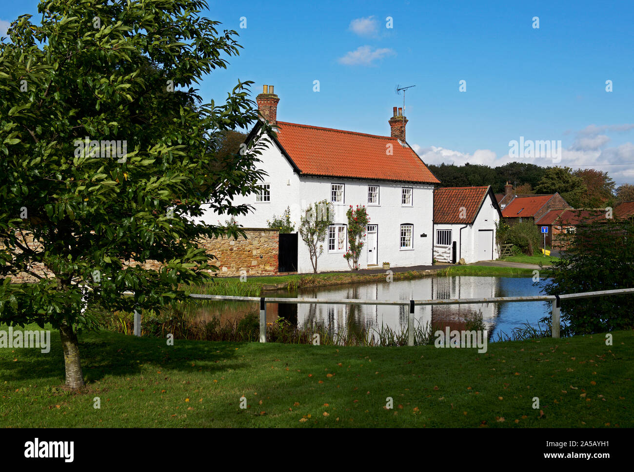 Forge Cottage and pond in the village of Bishop Burton, East Yorkshire ...