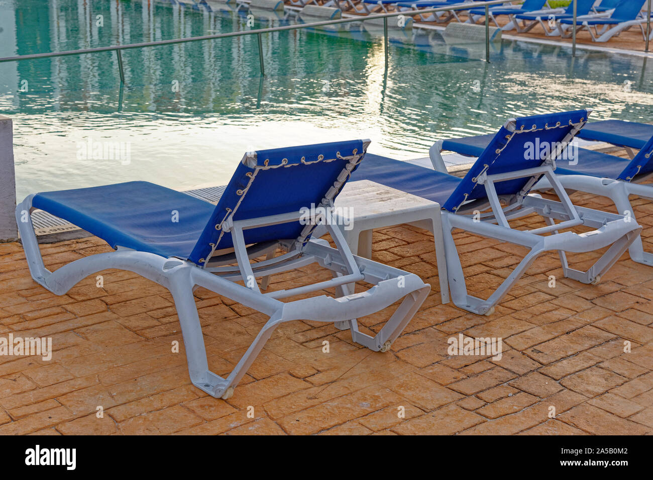Summer, travel, vacation and holiday concept. Beach chairs near ...