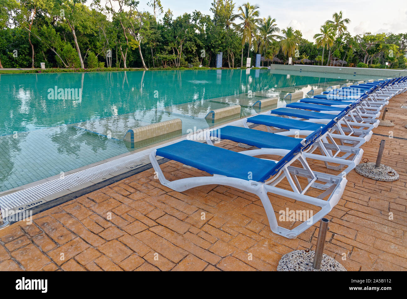 Summer, travel, vacation and holiday concept. Beach chairs near ...