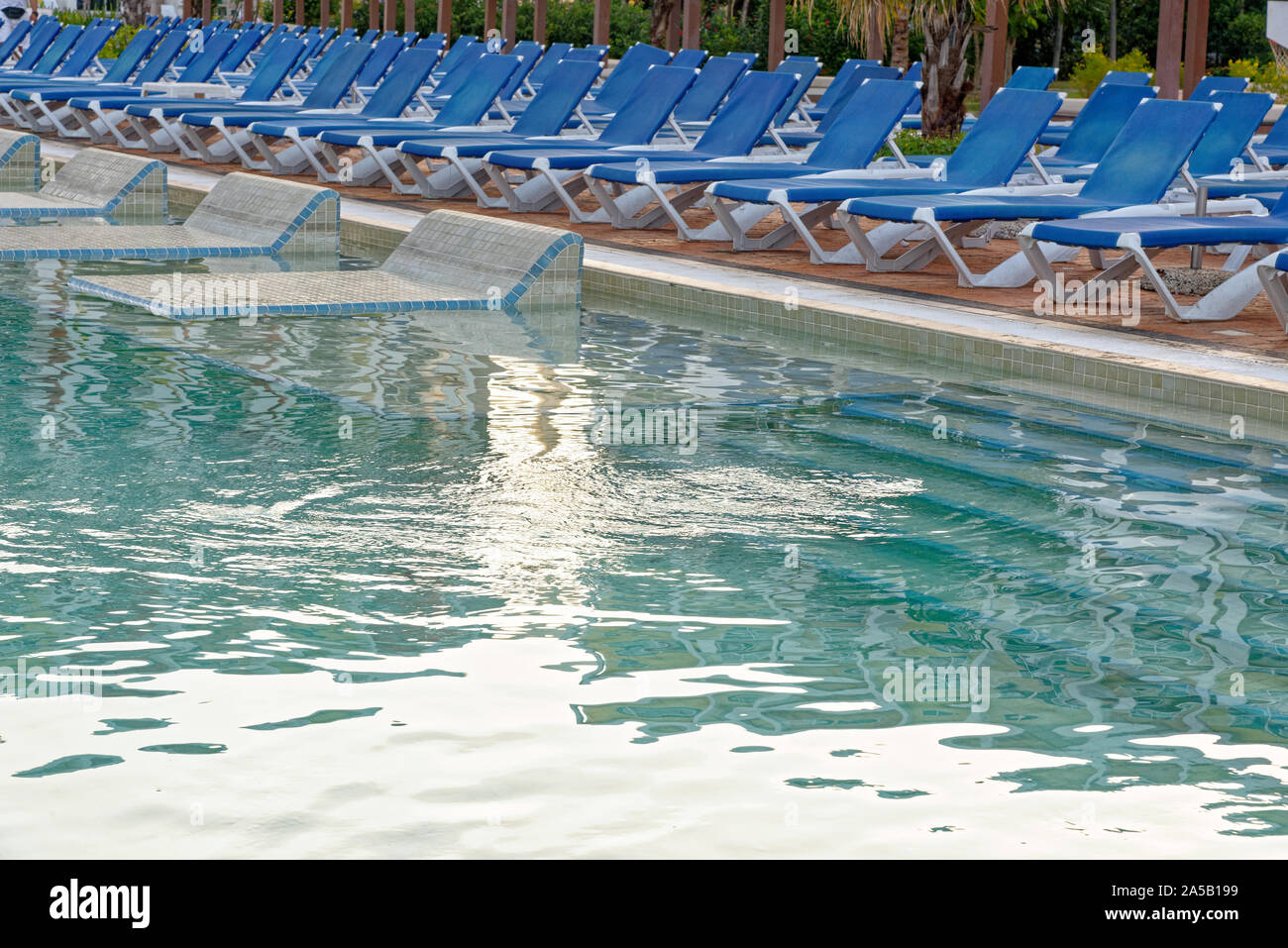 Summer, travel, vacation and holiday concept. Beach chairs near ...