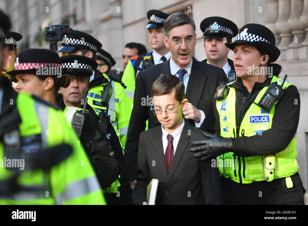 Leader of the House of Commons Jacob Rees-Mogg with his son Peter Theodore Alphege, as they are ...