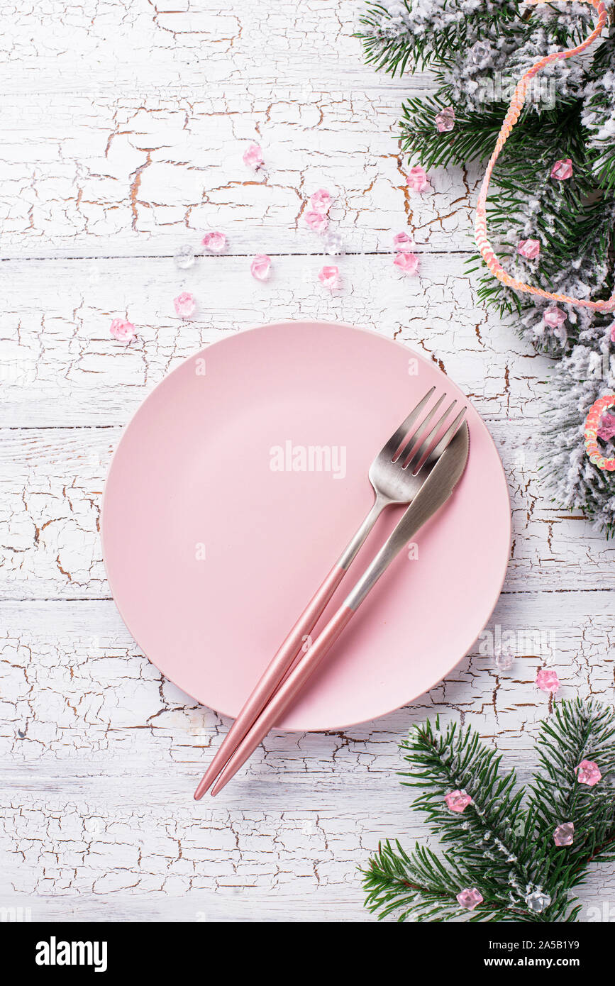 Christmas table setting in pink color Stock Photo - Alamy