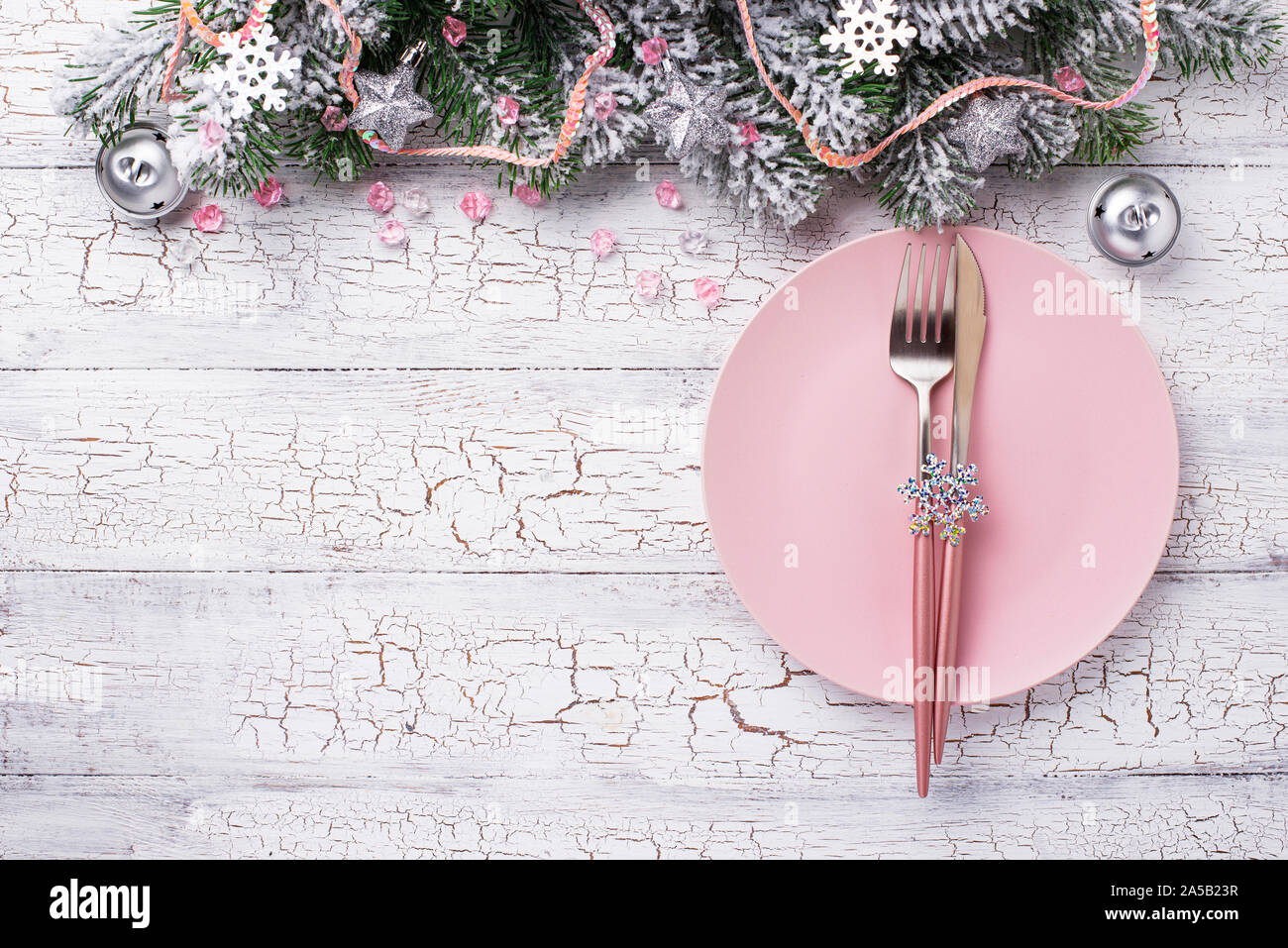 Christmas table setting in pink color Stock Photo - Alamy