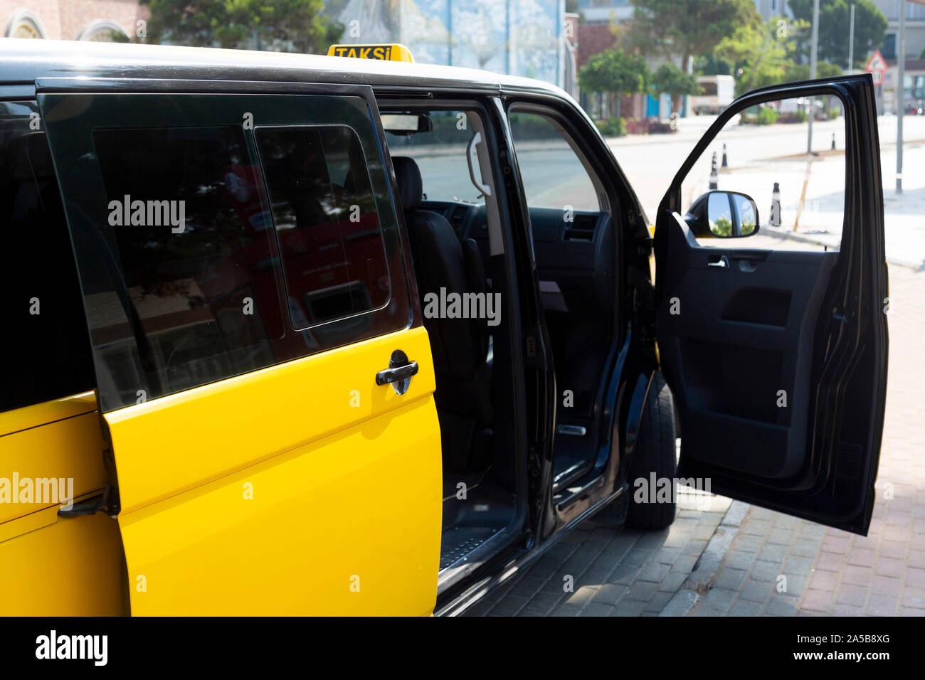 The minibus is a roomy taxi for transporting passengers Stock Photo - Alamy