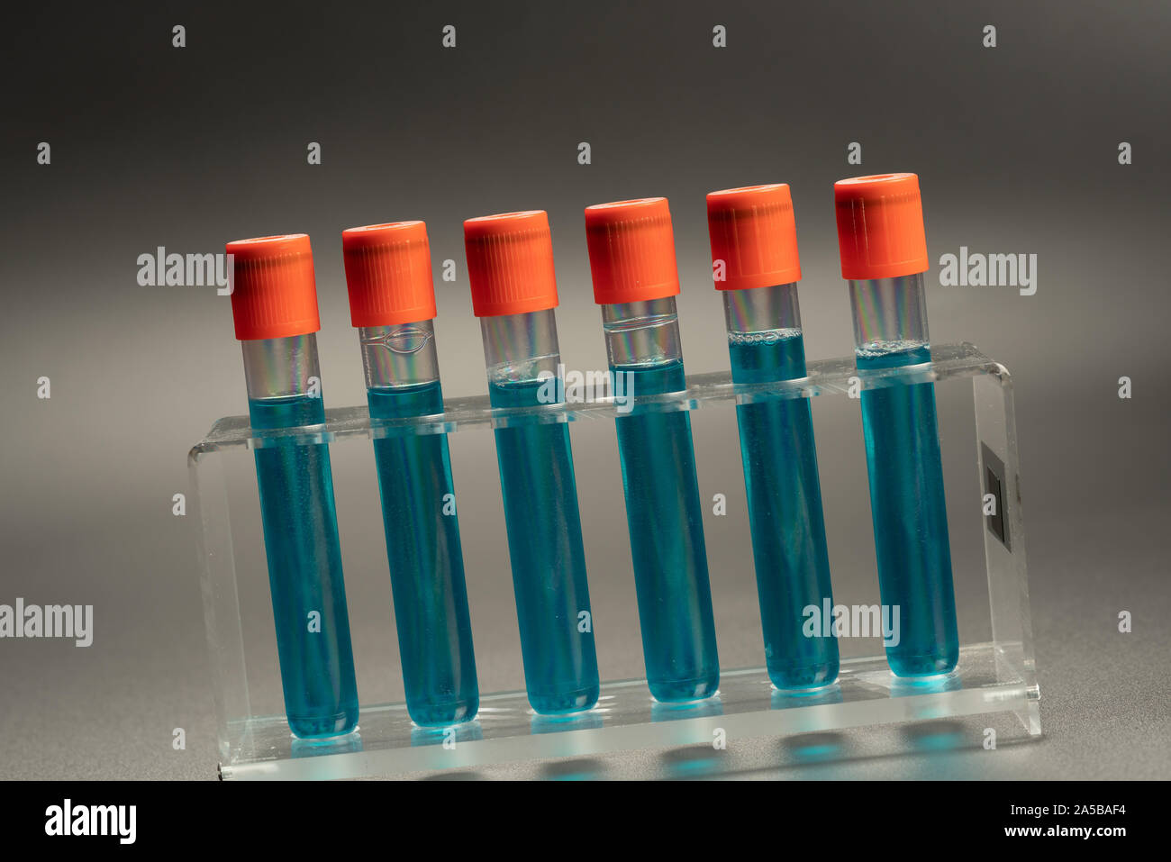Test tubes with chemical samples in science laboratory Stock Photo - Alamy