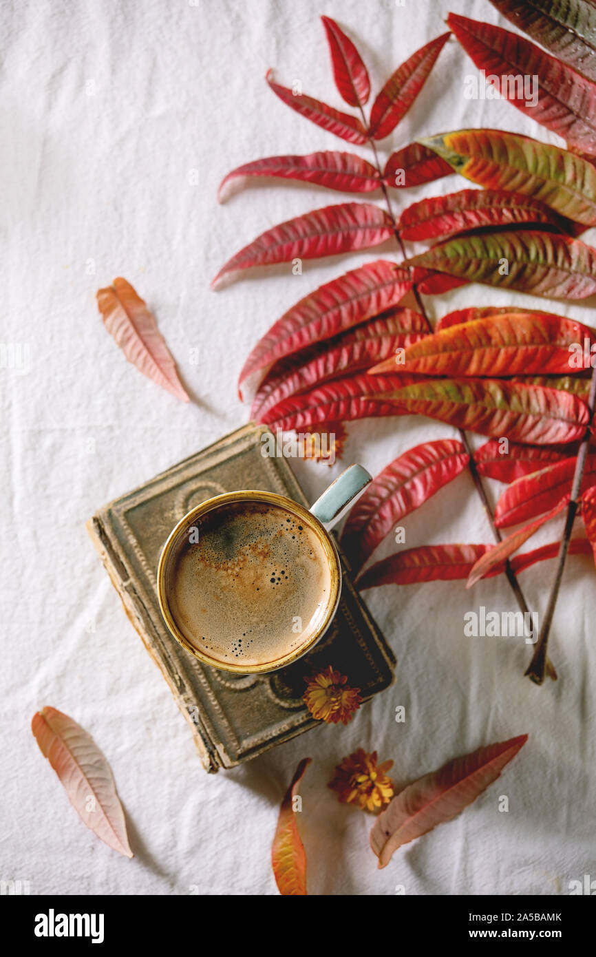 Coffee with autumn leaves Stock Photo - Alamy