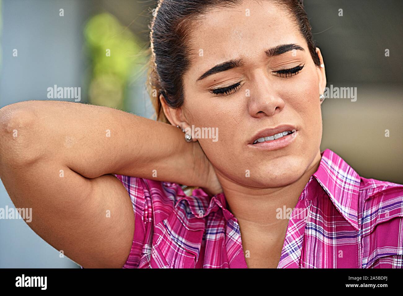 An Aching Attractive Woman Stock Photo - Alamy