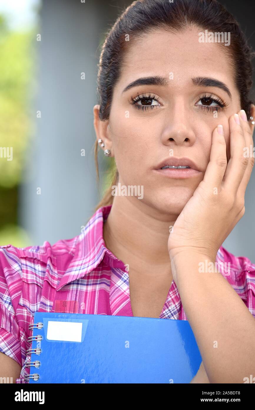 Adult Female Student With Notebooks And Stress Stock Photo - Alamy