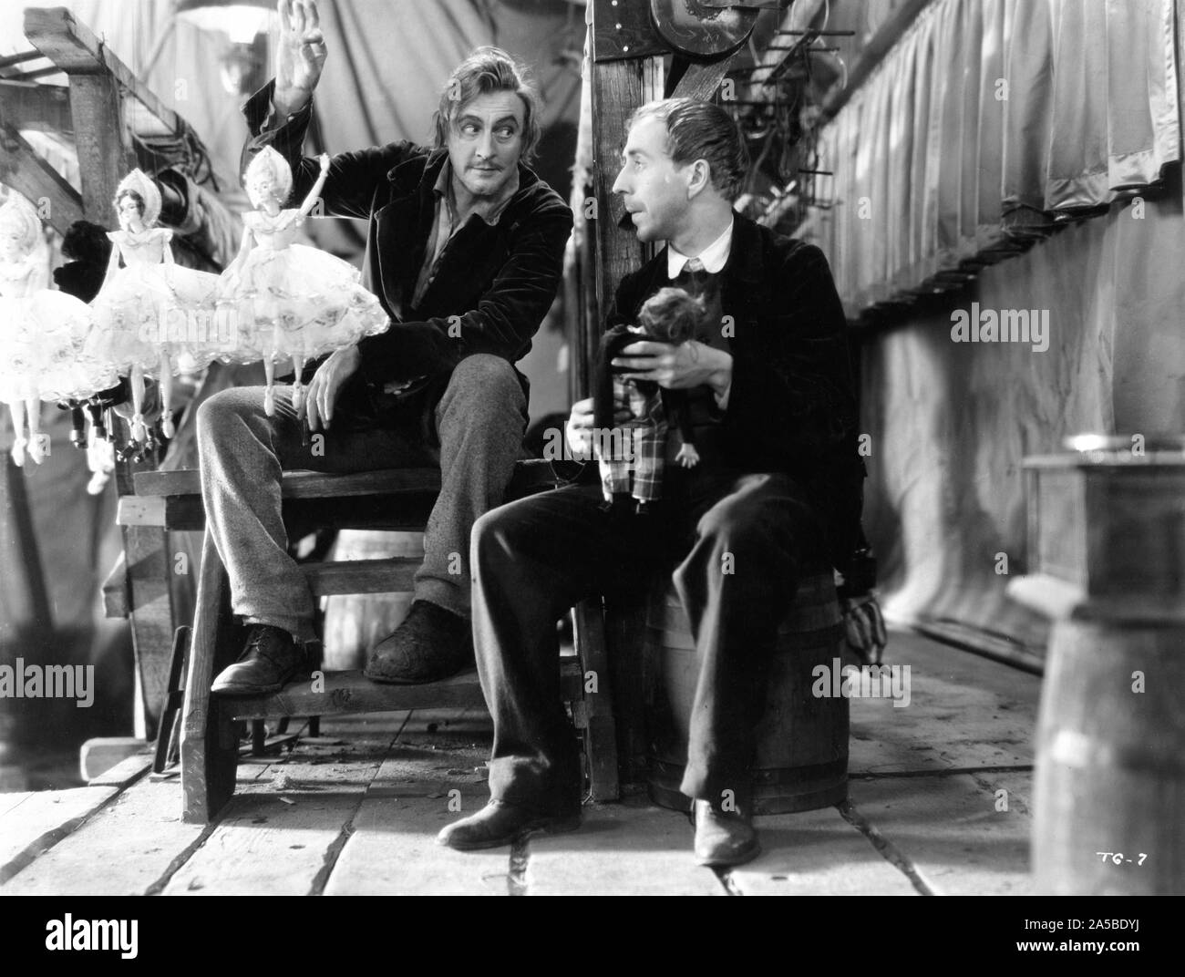 JOHN BARRYMORE and CHARLES BUTTERWORTH with puppets in THE MAD GENIUS ...