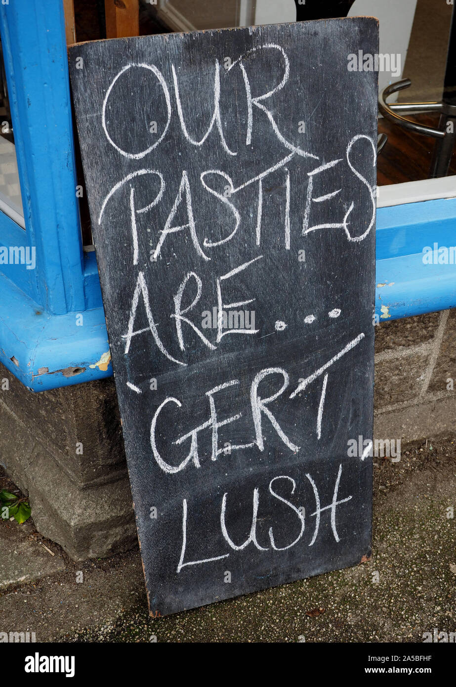 Our pasties are 'Gert Lush' sign at cafe in Newlyn, Cornwall, UK Stock ...