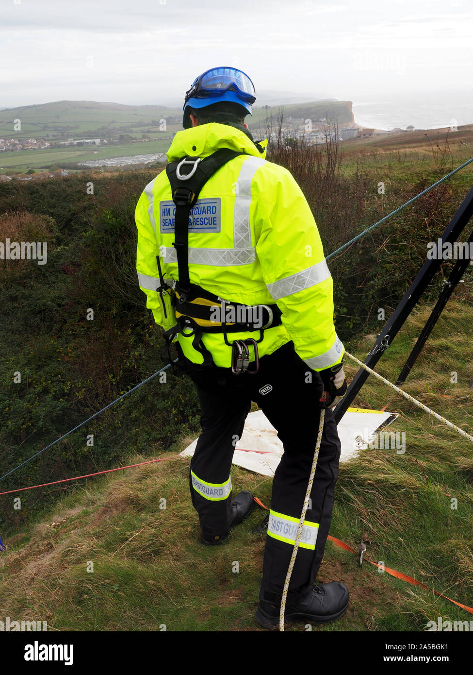 HM Coastguard rescue train on cliff rescue, Dorset, Uk Stock Photo - Alamy