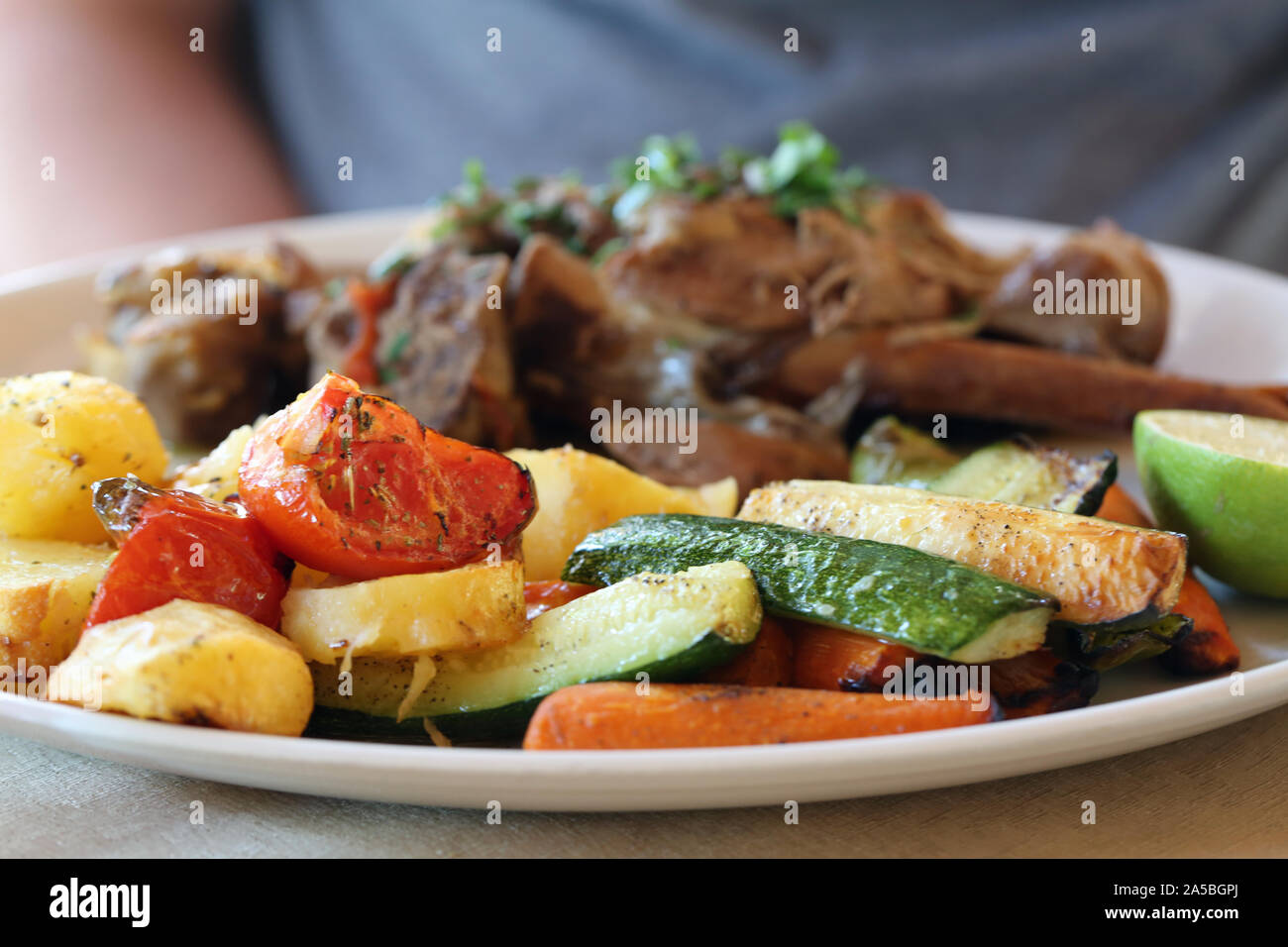 Portion grilled meat vegetables in hi-res stock photography and images ...