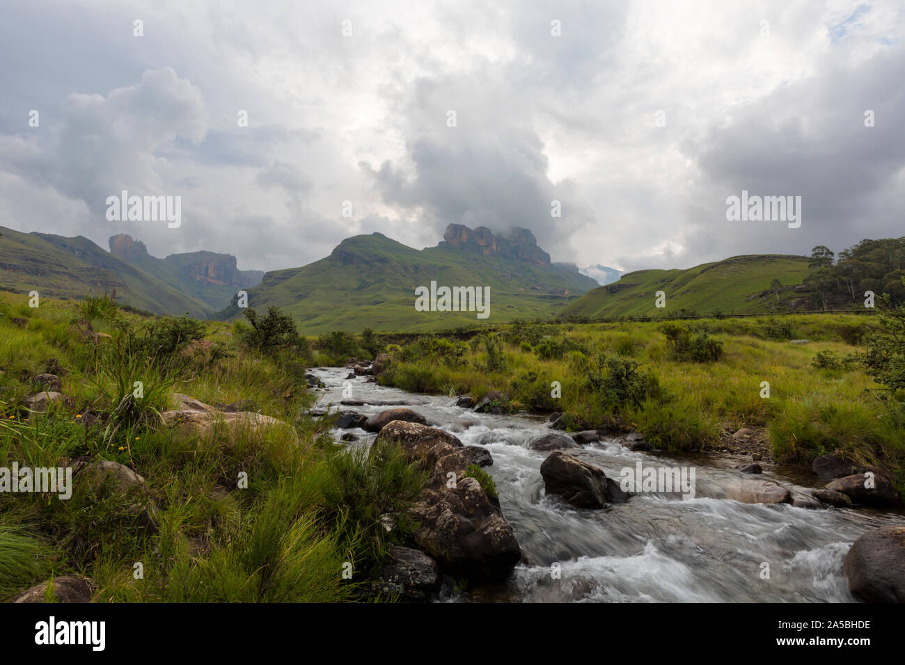 Mountain stream and rain clouds Stock Photo - Alamy