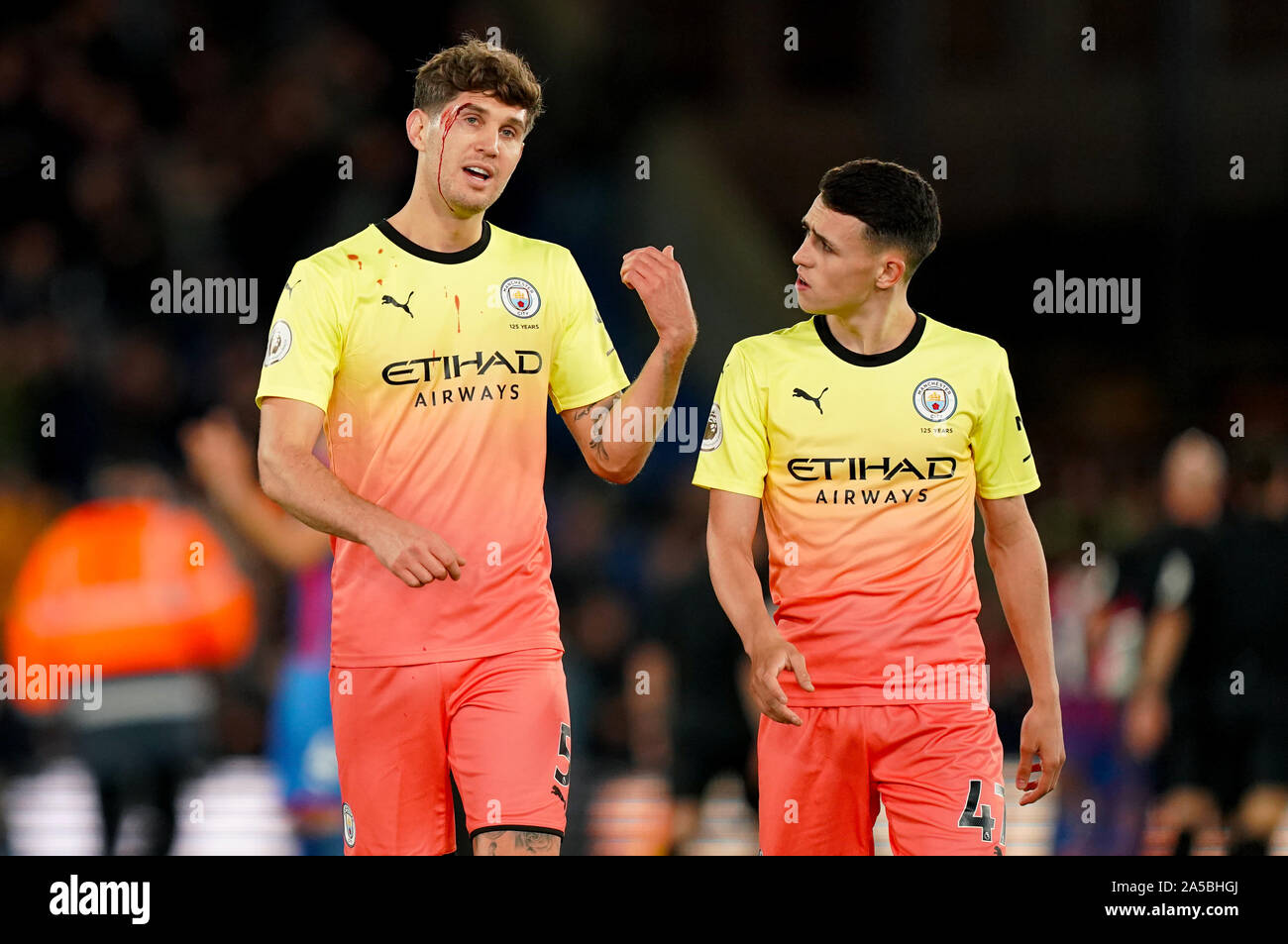 Manchester City's John Stones and Phil Foden after the final whistle of ...