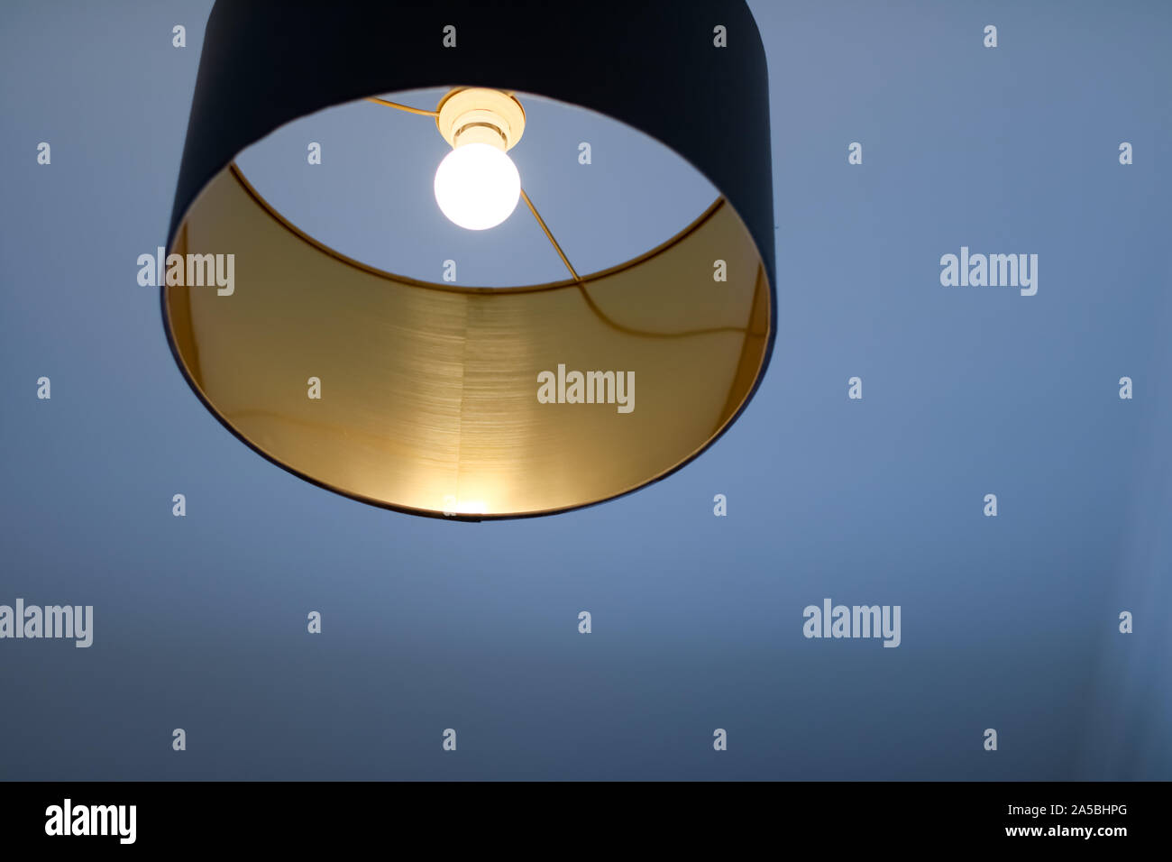 Interior design, indoor lamps and electricity concept - Golden lamp in ...