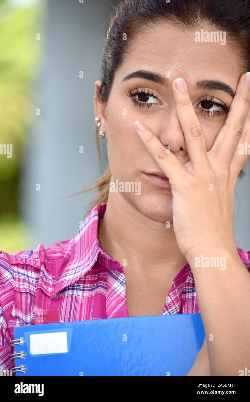 Adult Female Student With Notebooks And Stress Stock Photo - Alamy