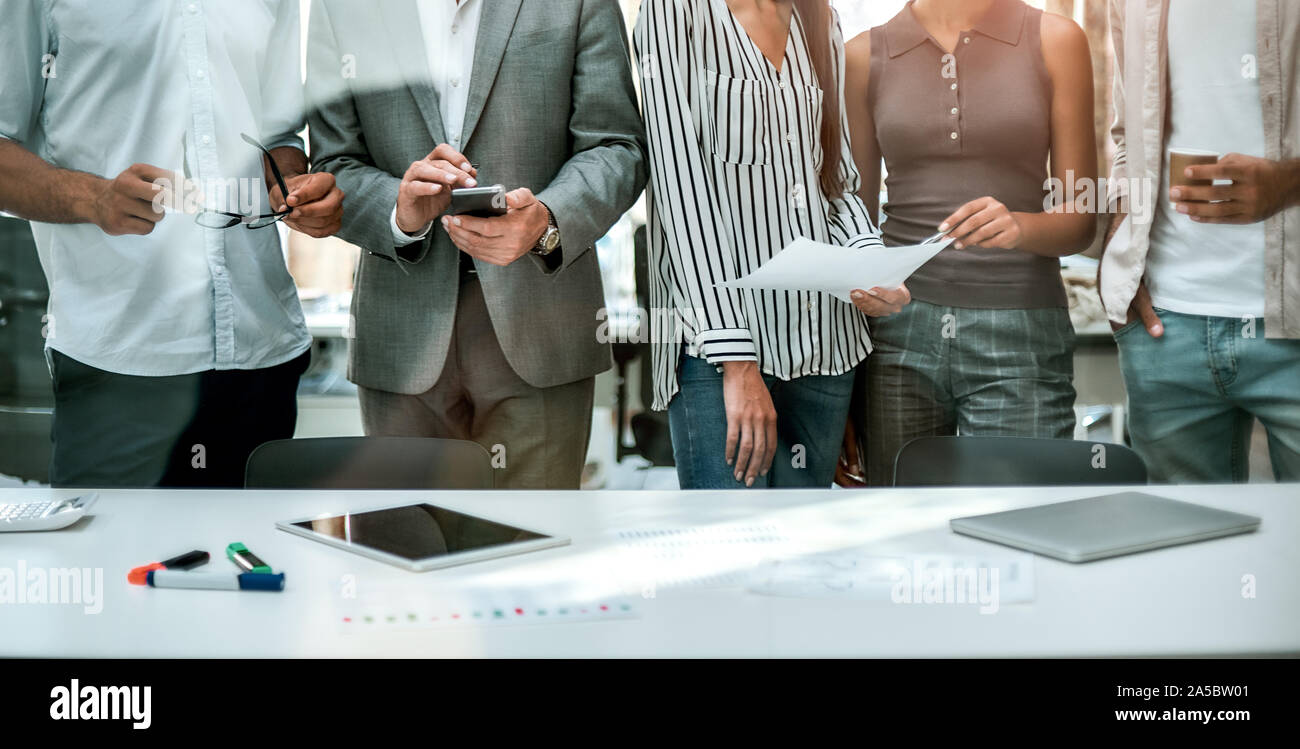 Office life. Cropped photo of business people standing together in the ...