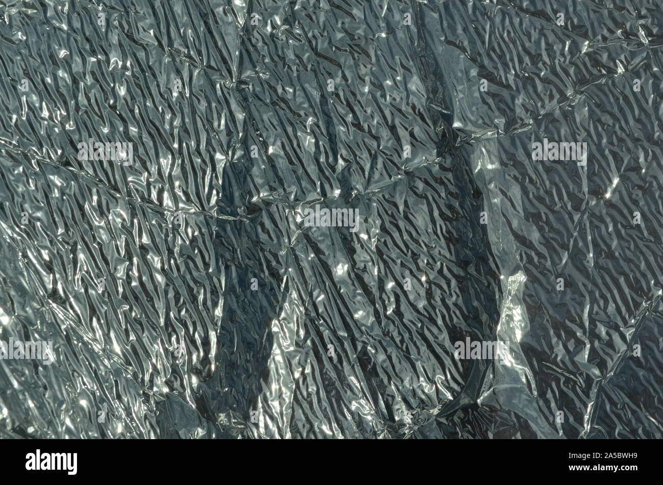 Silver reflective fabric pattern Stock Photo - Alamy