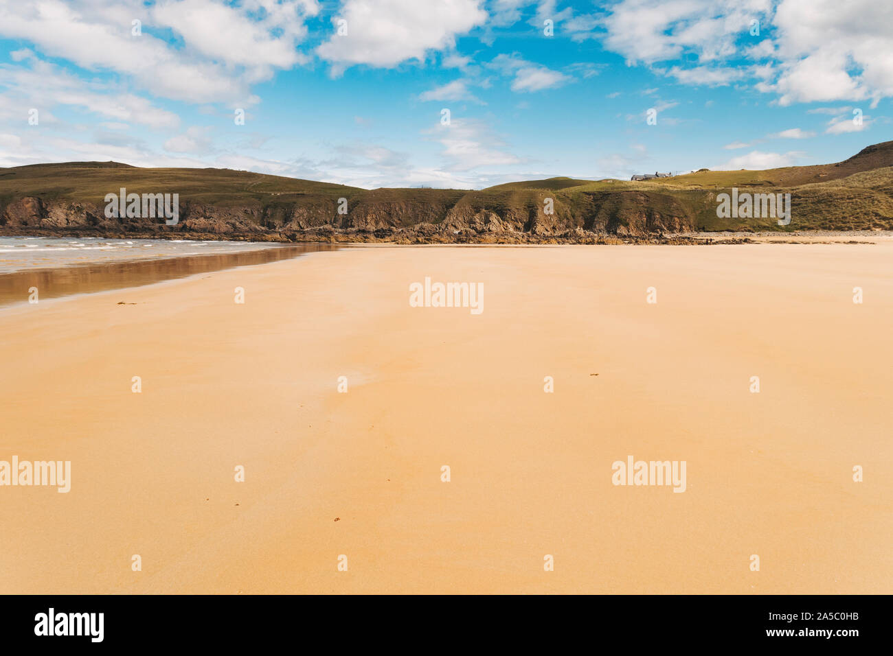 A calm, quiet, sunny day at secluded Bettyhill Beach in Farr parish, on ...