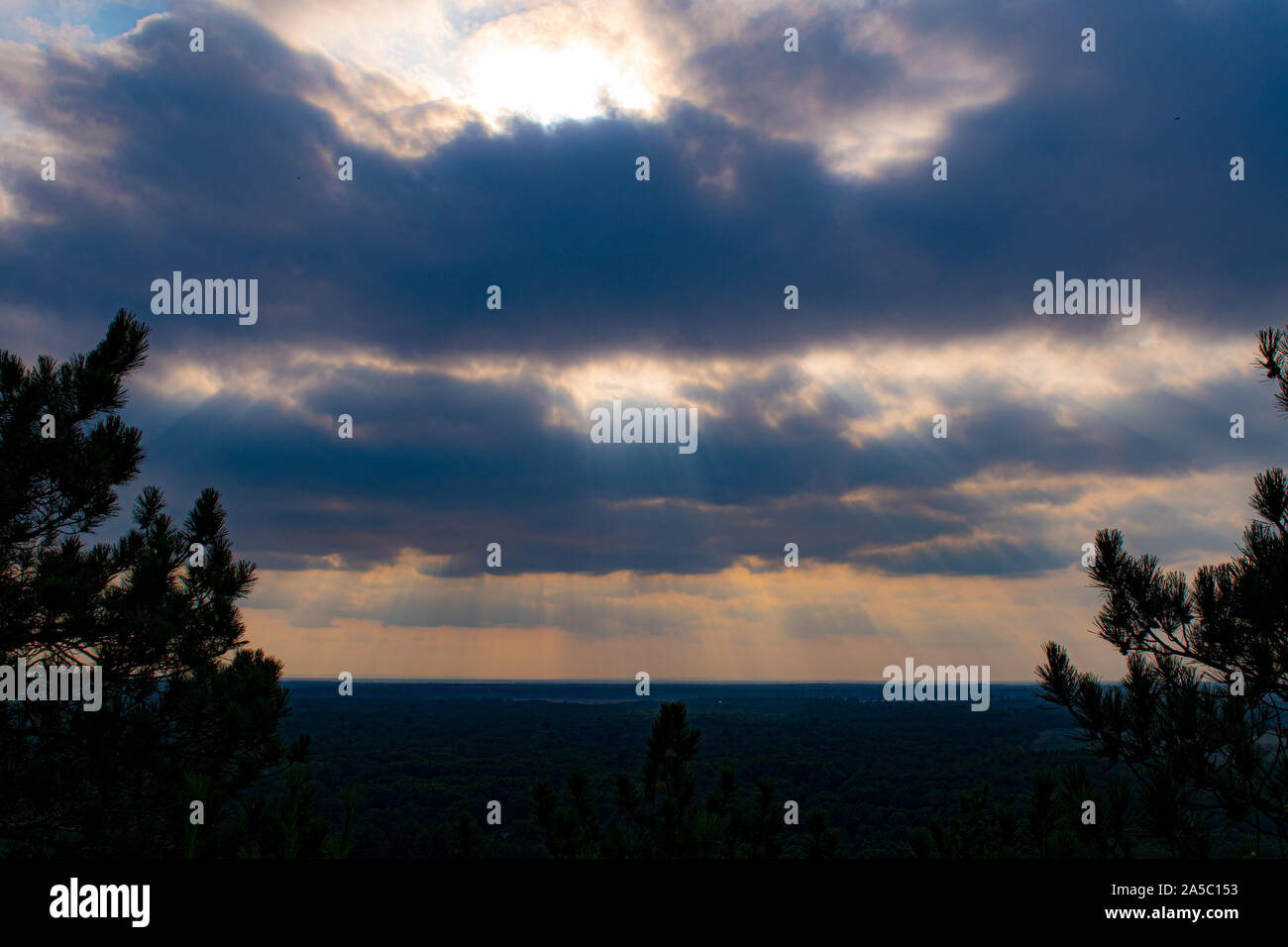 Sunbeams through Clouds Stock Photo - Alamy