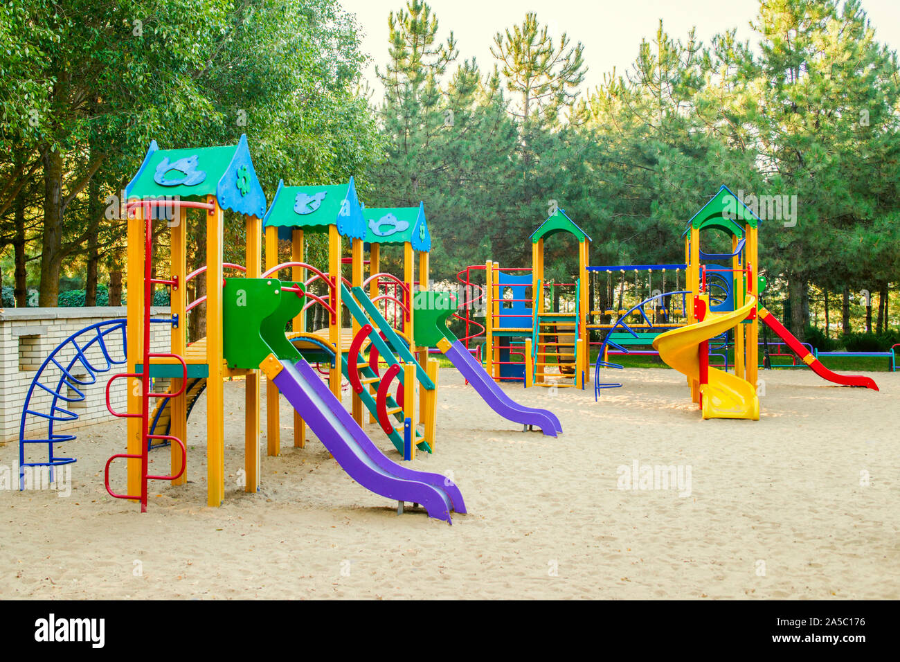 Colorful children playground activities in public park. Safe modern ...