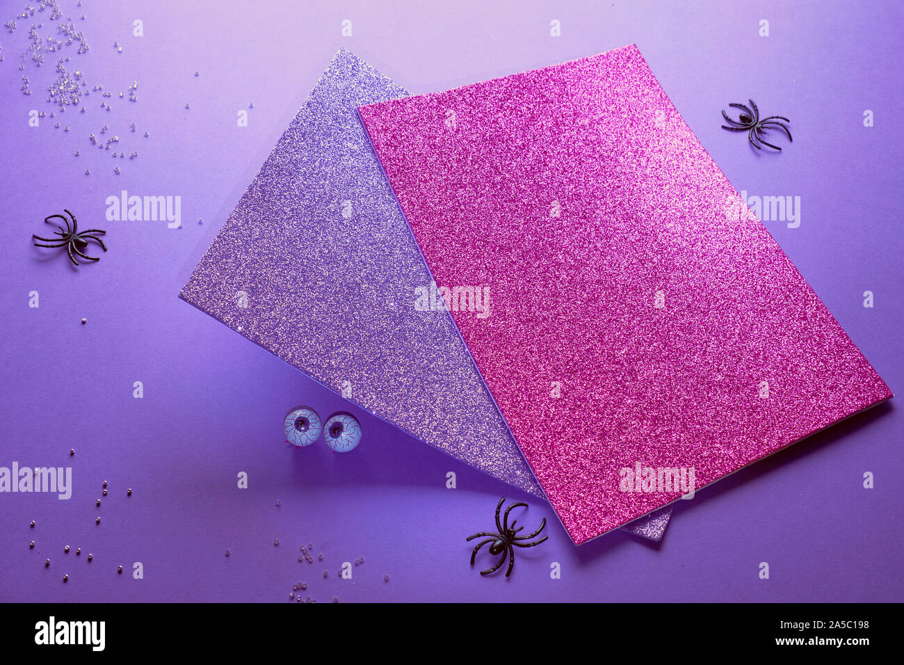 Creative purple and pink Halloween background with copy-space on ...