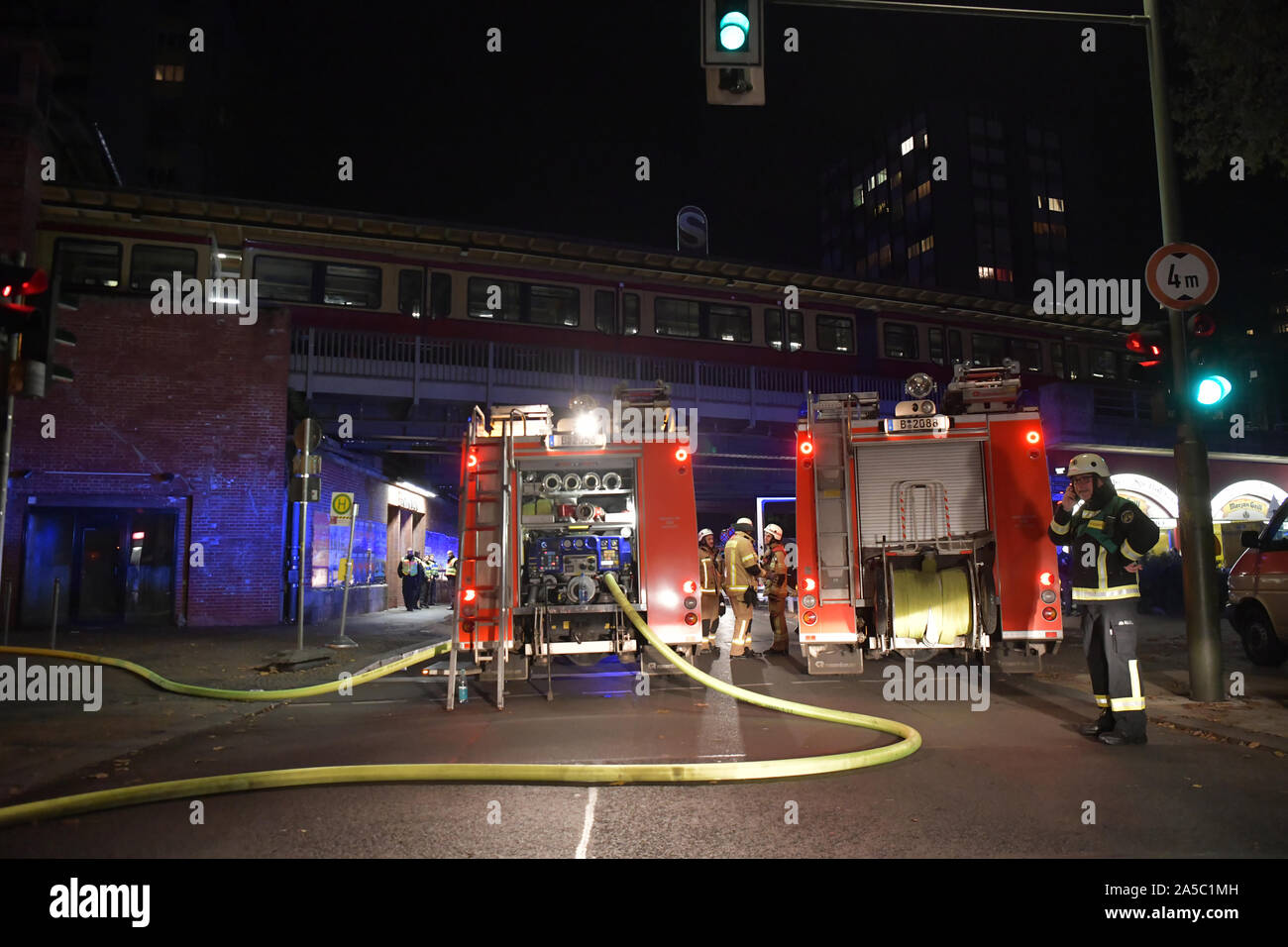 19 October 2019, Germany (German), Berlin: Firefighters are standing in ...
