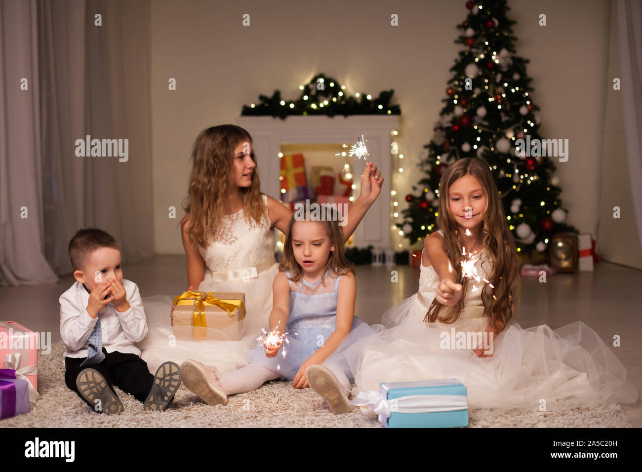 Kid gets christmas present hi-res stock photography and images - Alamy