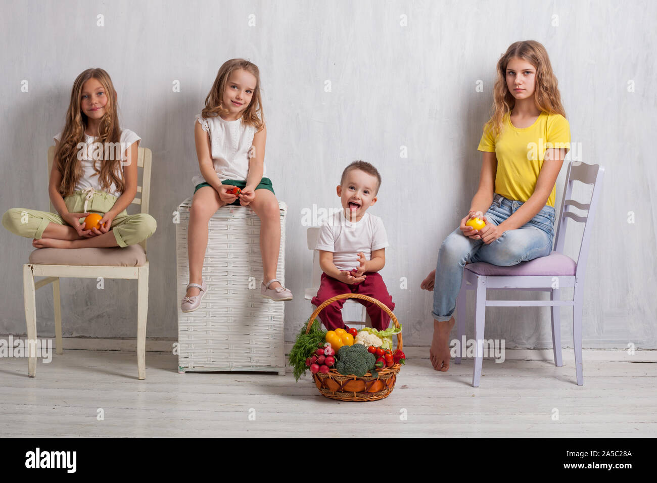 Boy with a basket of fruits hi-res stock photography and images - Alamy