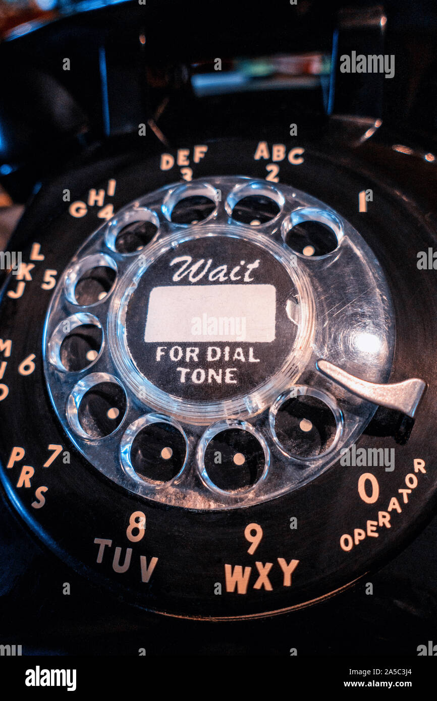 Old fashioned finger dial on old phone Stock Photo - Alamy