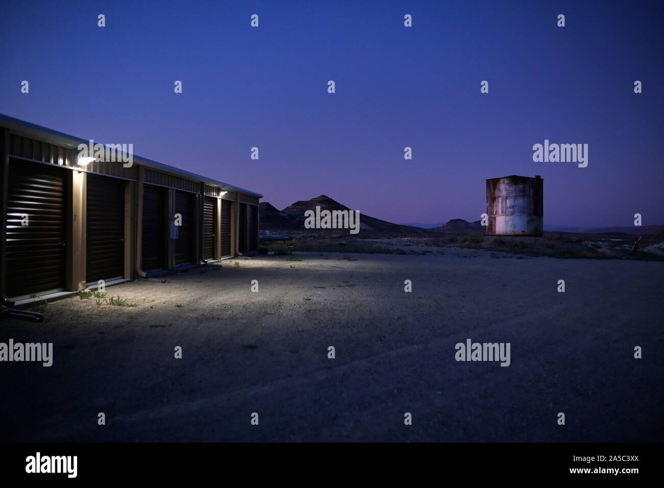 Beautiful shot of garages near each other with a purple sky in the ...