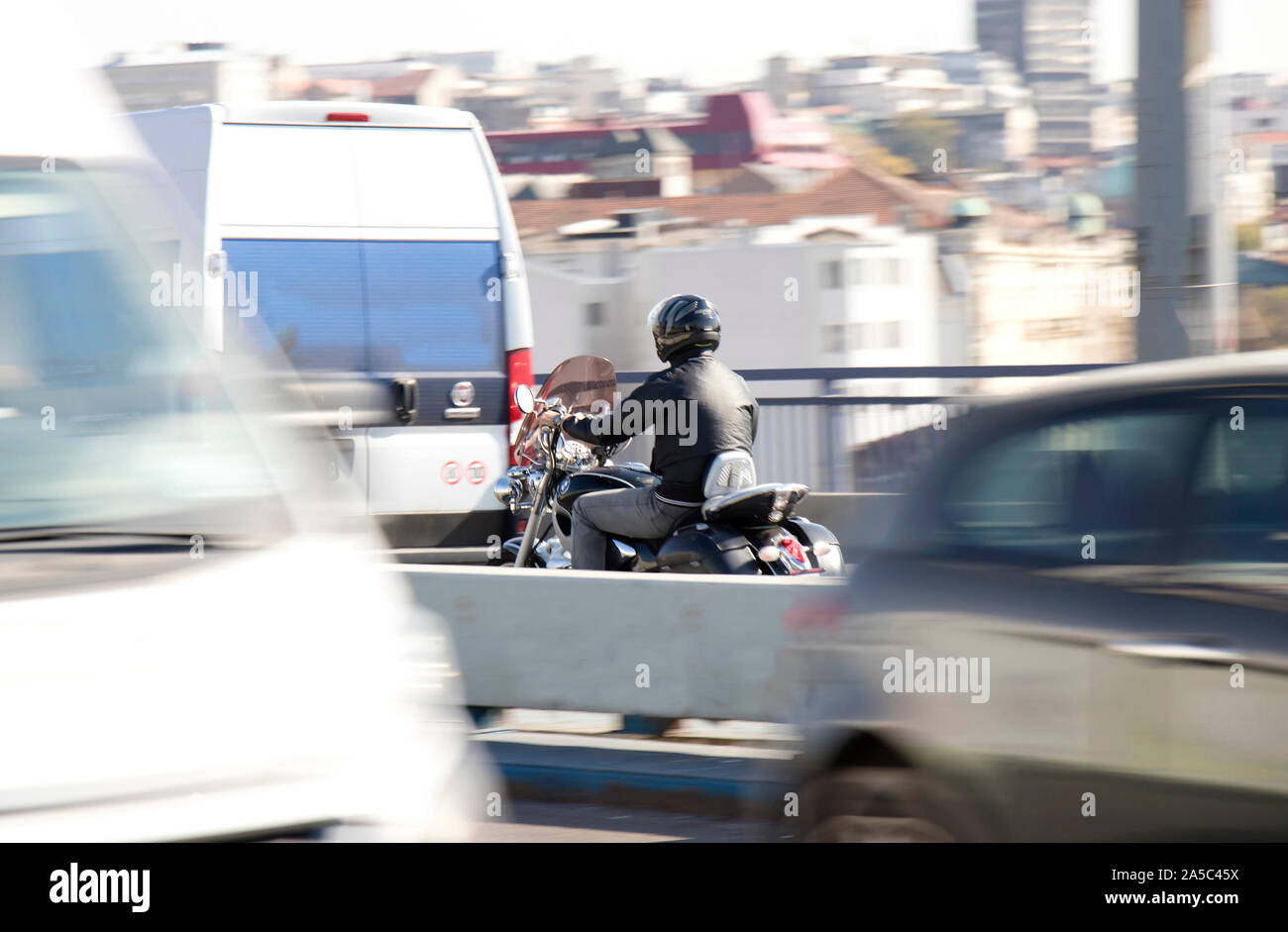 Motorbike rider city traffic hi-res stock photography and images - Alamy