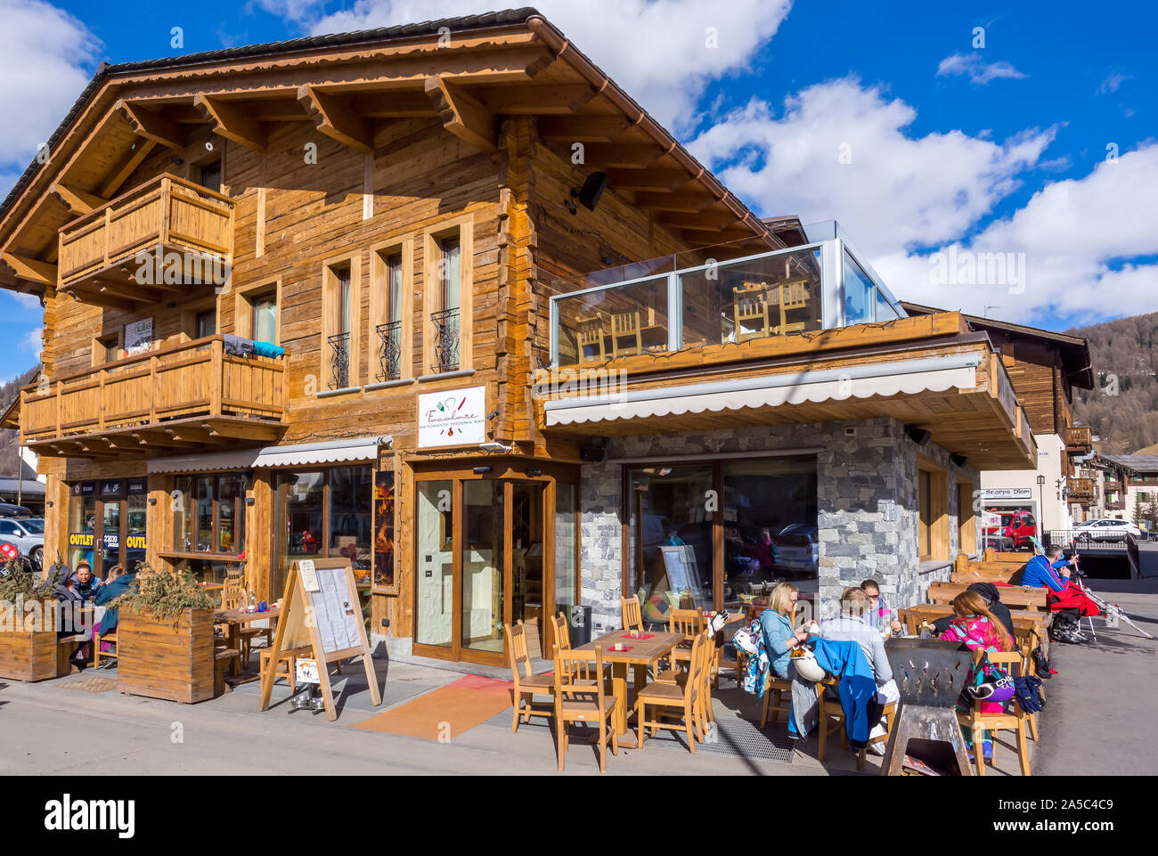 Livigno, Italy, April 2016 Traditional Alpine wooden hut or house ...