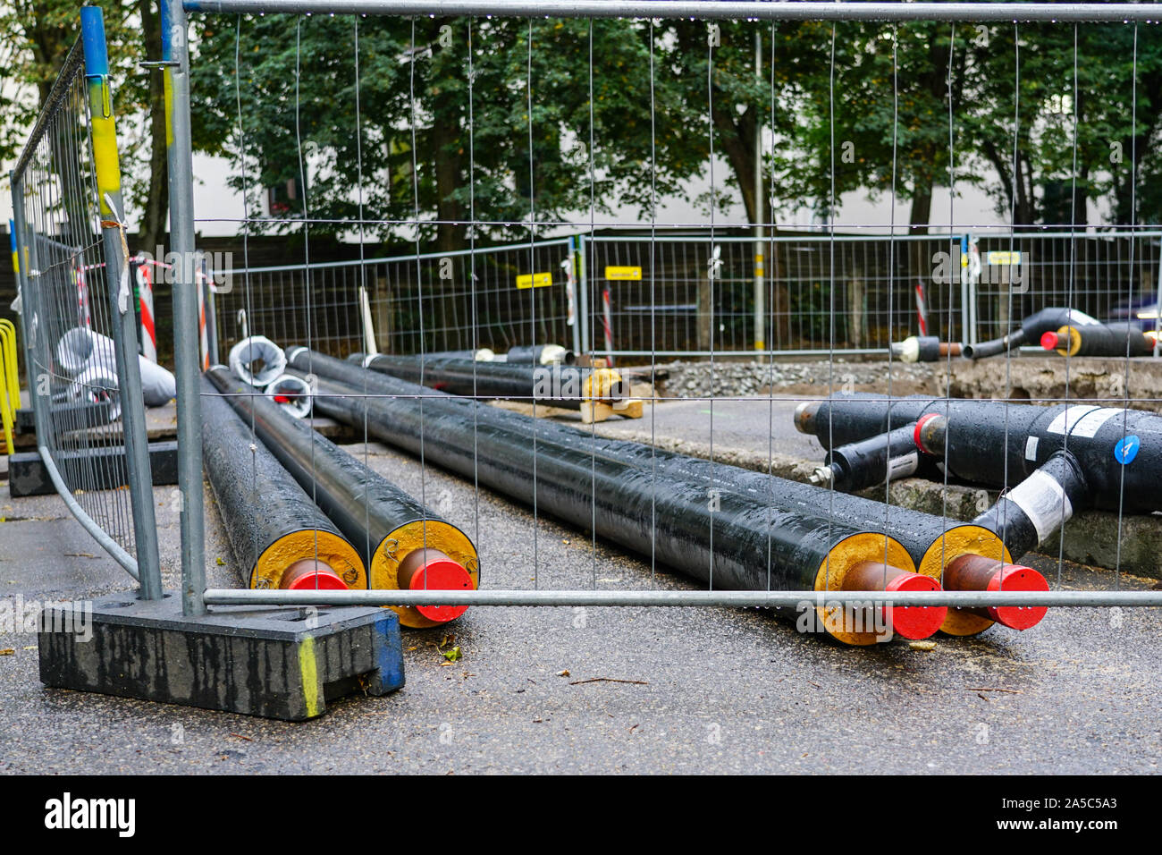 underground heating system pipes replacement on the city street Stock ...