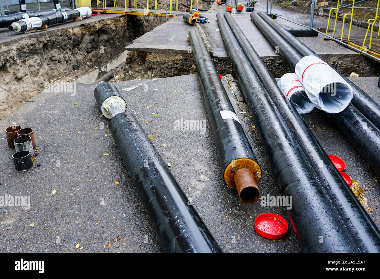 underground heating system pipes replacement on the city street Stock ...