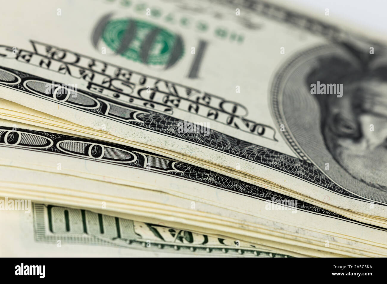 a skewed stack of old us dollar banknotes - close shot Stock Photo - Alamy