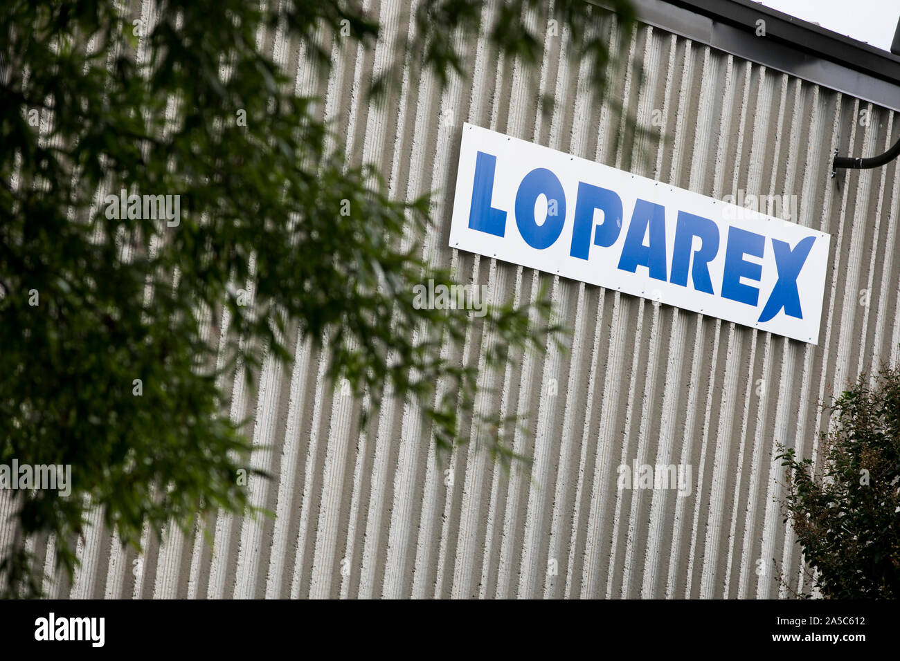 A logo sign outside of a facility occupied by Loparex in Eden, North ...