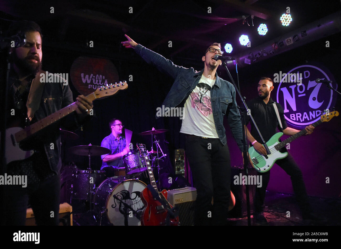 Jonathan Bonilla, Andrew Zehnal, Mike Montali and Chris Urriola perform ...